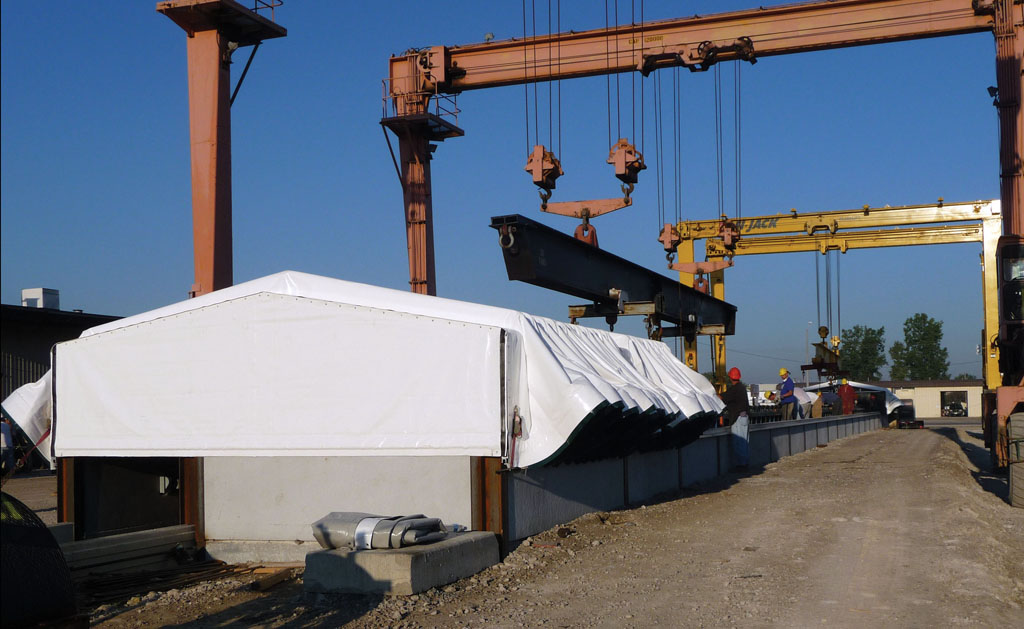 Chameleon: Retractable Enclosures for Precast Curing & Production
